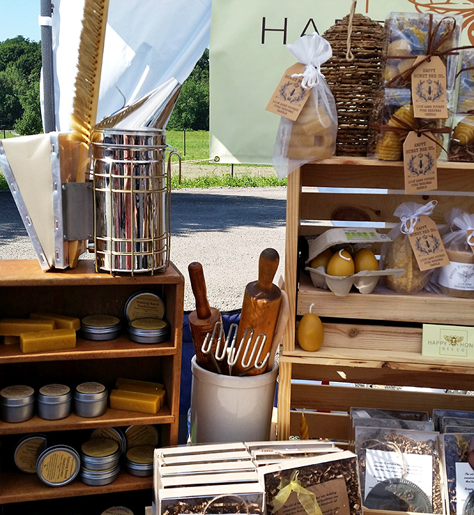 Honey heaven! This artisanal display showcases nature's liquid gold alongside handcrafted beeswax products that would make even Winnie the Pooh pause in appreciation.
