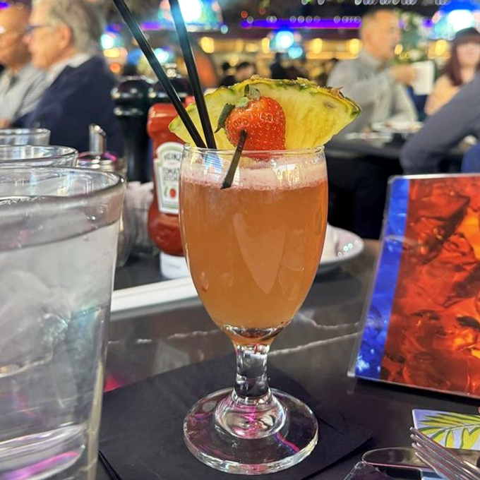 A Hawaiian Sunset cocktail that tastes like vacation in a glass. The kind of drink that makes you forget there's a desert outside.