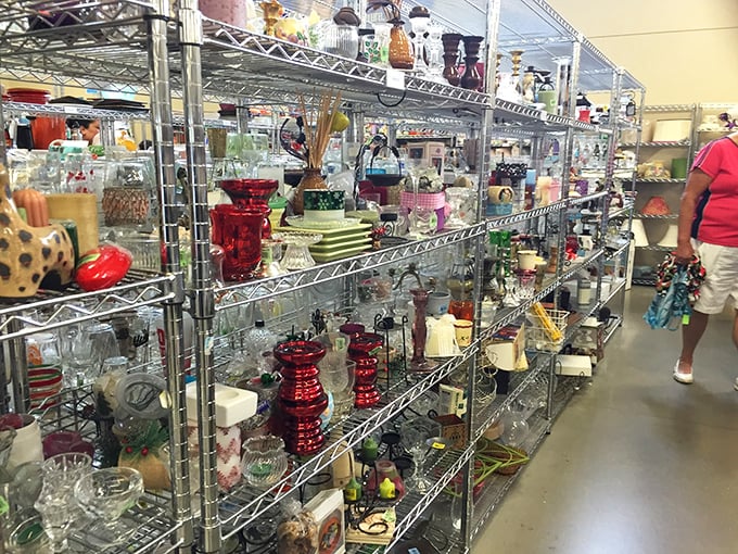 Glassware galore catches the light and shoppers' attention. Each shelf tells stories of dinner parties past and cocktail hours future.
