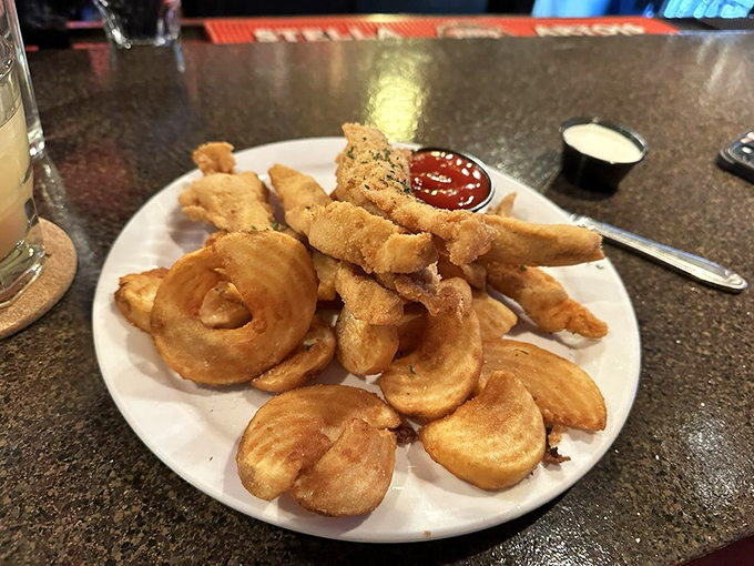 Onion rings and fried delights that would make your cardiologist wince and your taste buds dance. Some pleasures are worth the extra treadmill time.