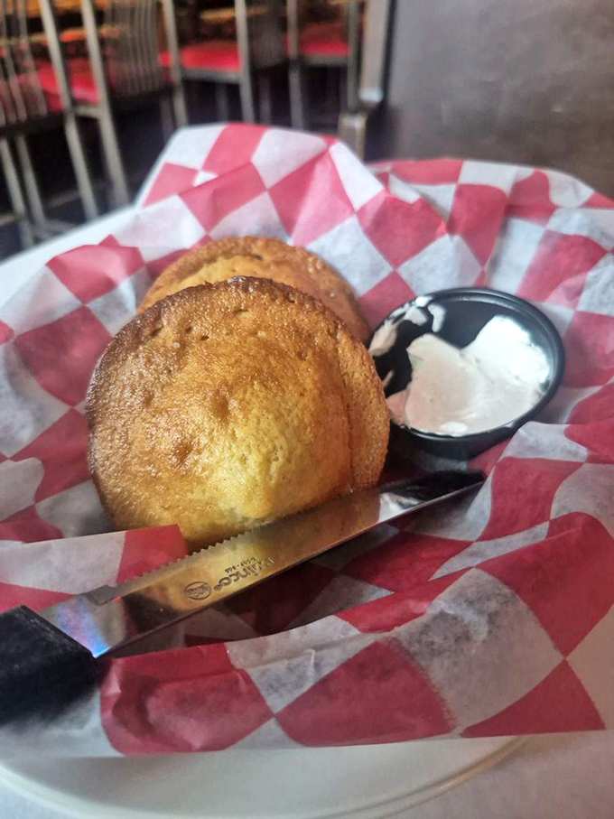 Golden cornbread that makes you question all other cornbreads you've ever known. The butter melts in real-time, creating a moment of pure edible poetry.
