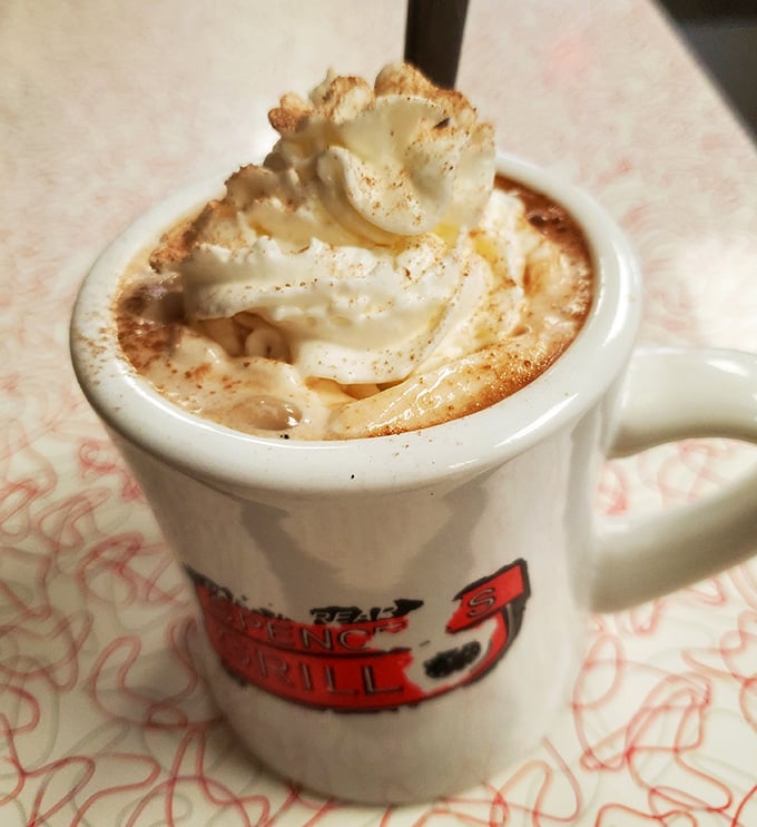 Hot chocolate elevated to an art form, with a cloud of whipped cream dusted with cinnamon &ndash; winter mornings never had it so good.
