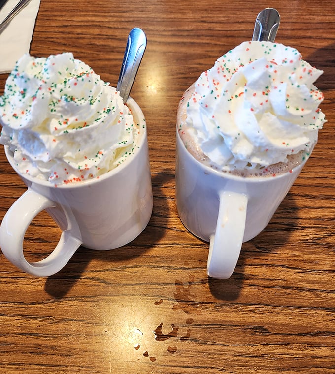 Hot chocolate topped with whipped cream and sprinkles &ndash; because sometimes adults deserve to feel like kids again, especially at breakfast.