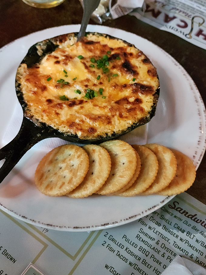 Bubbling hot crab dip with a golden crust that makes those crackers the luckiest vehicles of transportation since the Orient Express.