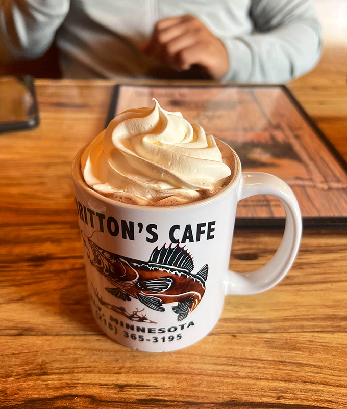 Hot chocolate that doesn't just arrive &ndash; it makes an entrance. That whipped cream crown deserves its own royal title.