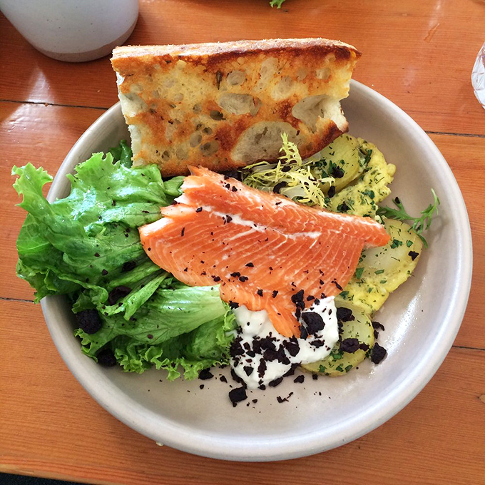 A plate that celebrates Oregon's bounty&mdash;house-cured trout, fresh greens, and bread that makes you question every other bread you've ever known.
