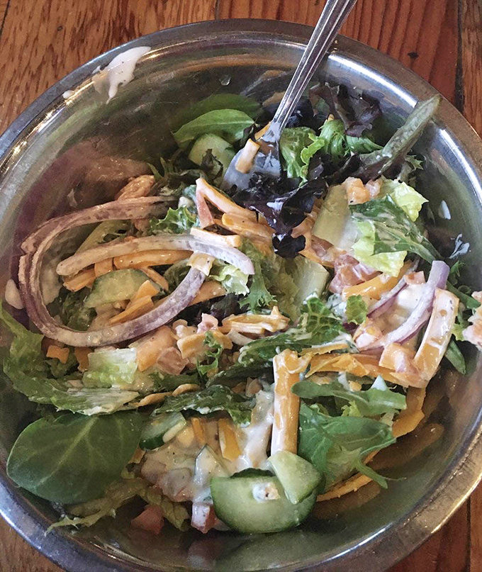 Even the house salad gets the Sauced treatment &ndash; crisp greens, fresh vegetables, and shredded cheese offering a refreshing counterpoint to all that glorious meat.