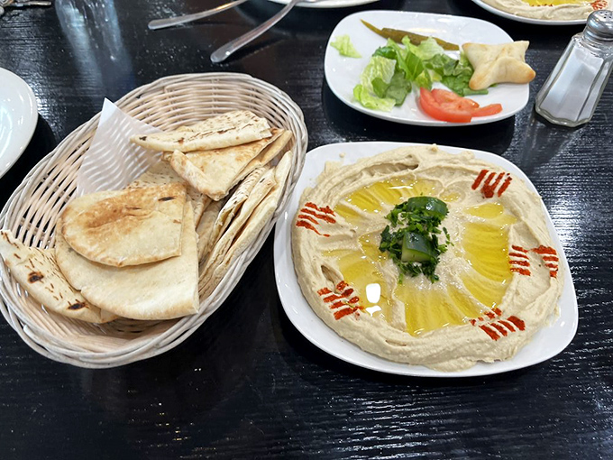 Hummus so smooth it could teach silk lessons, paired with pillowy pita bread. This is the Middle Eastern equivalent of a warm hug.