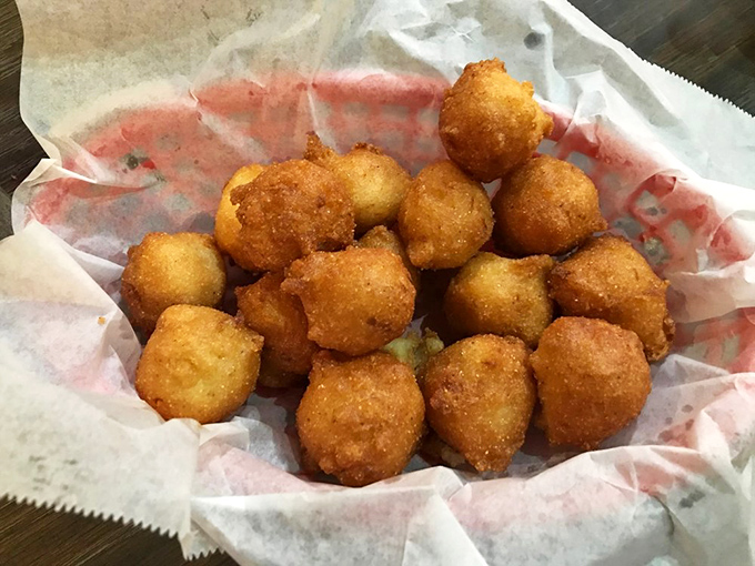 Hushpuppies that deserve their own fan club&mdash;golden orbs of cornmeal joy that somehow manage to be both crispy and tender simultaneously.