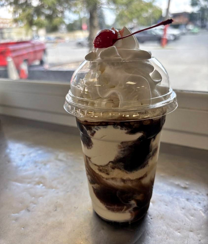 This hot fudge sundae isn't just dessert &ndash; it's therapy in a glass with a cherry on top.