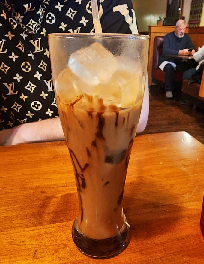 Coffee gets dressed up for a night on the town in this tall glass of iced perfection.