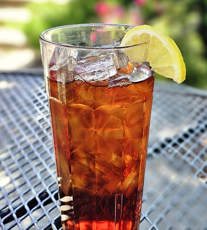 Montana summer in a glass – this amber-hued iced tea with a lemon wedge is the perfect companion to any Café Regis feast.
