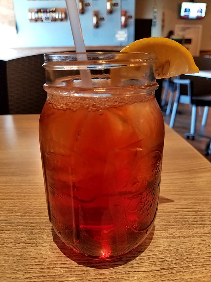 Sweet tea served in a proper Mason jar with a lemon wedge&mdash;the unofficial wine pairing for Maryland seafood feasts.