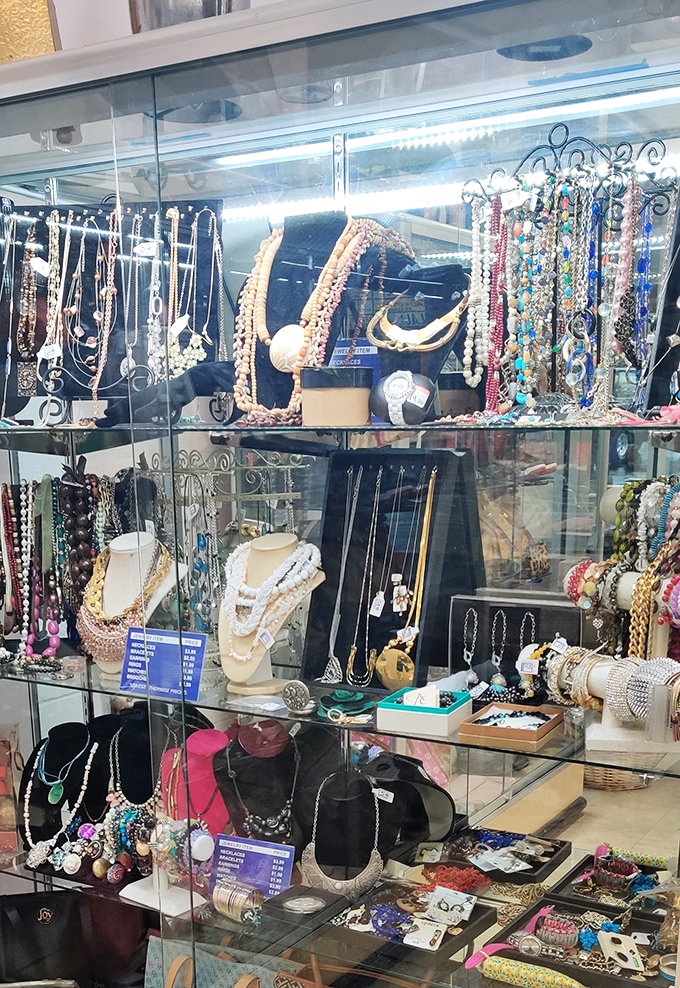 Jewelry cases: where costume meets heirloom in a glittering display. Someone's grandmother's necklace awaits its second chapter.