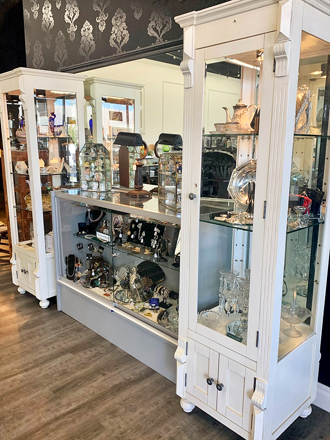 Elegant display cases house jewelry that whispers stories of special occasions past. Someone's former treasures waiting for a second chance to accessorize new memories.