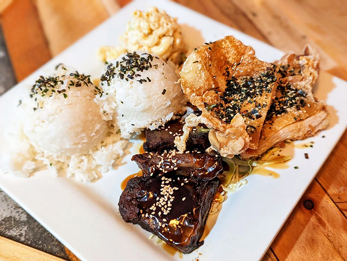 A plate that showcases Hawaii's multicultural soul &ndash; short ribs, rice, and crispy wonton chips creating the holy trinity of island comfort food.