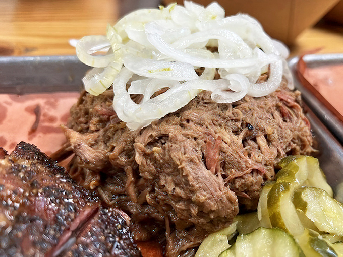 Pulled meat topped with pickles and onions &ndash; a harmony of textures and flavors that makes you wonder why you'd eat anything else.