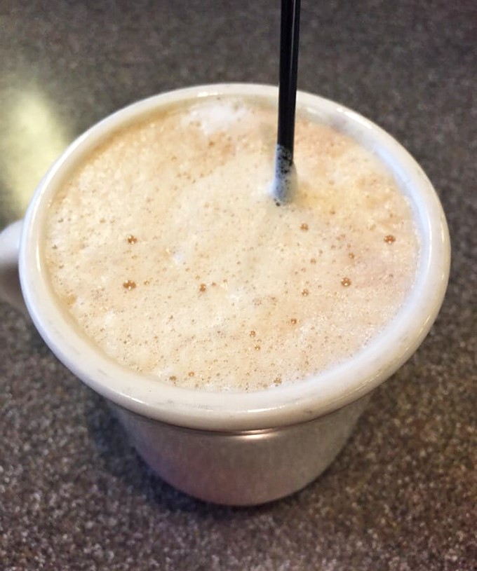 This isn't just coffee—it's morning salvation in ceramic form, with foam so perfect it deserves its own Instagram account.