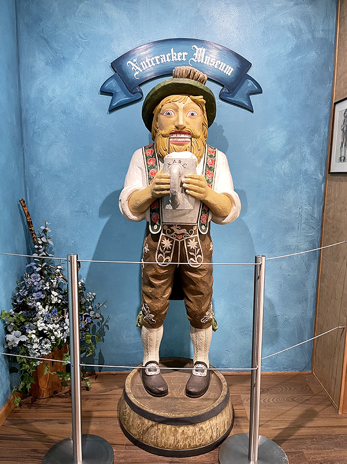 The Nutcracker Museum's guardian welcomes visitors with wooden enthusiasm, standing as testament to humanity's enduring question: "How many nutcrackers is too many?"