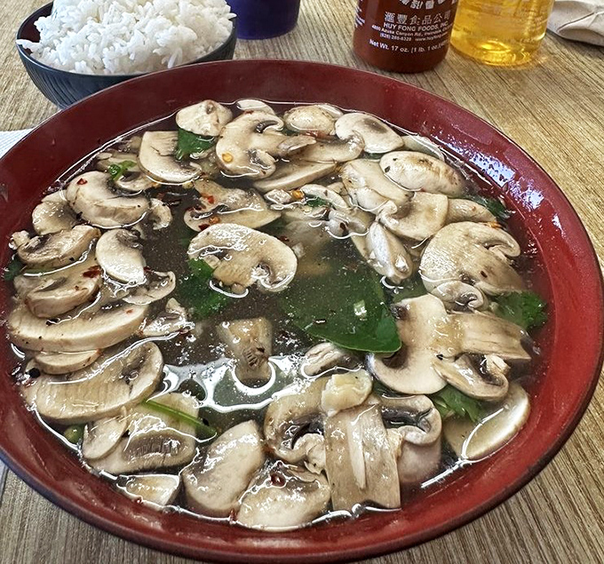 A soup so comforting it could end international conflicts. Mushrooms and tofu swimming in a broth that whispers secrets of generations-old recipes.