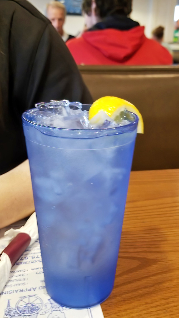A tall glass of blue lemonade&mdash;the perfect companion for cutting through the richness of comfort food and cooling an overexcited palate.