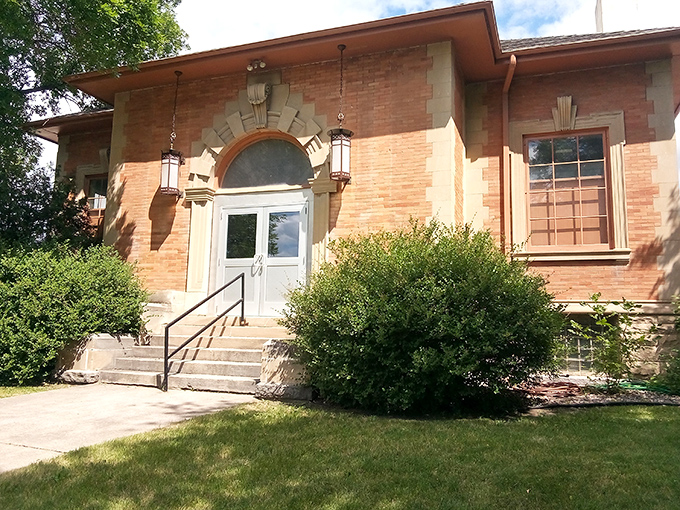 The library's warm brick facade and Art Deco touches invite you into a world where community and knowledge have shared quarters for generations.