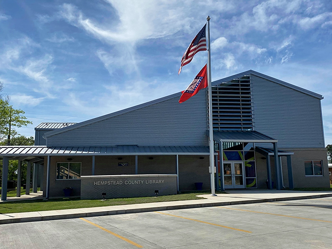 The Hempstead County Library looks like it means business about community resources, combining modern function with Arkansas pride flying high overhead.