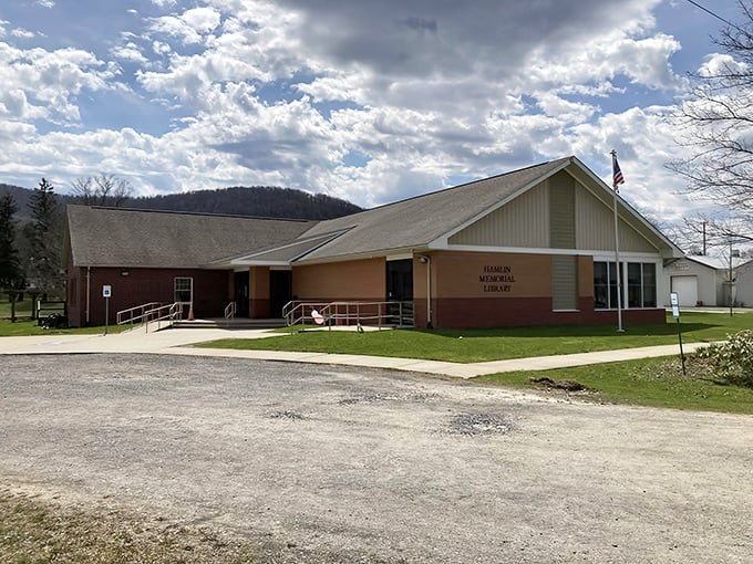 The Hamlin Memorial Library serves as both knowledge repository and community living room, proving some institutions are worth preserving in their simplest form.