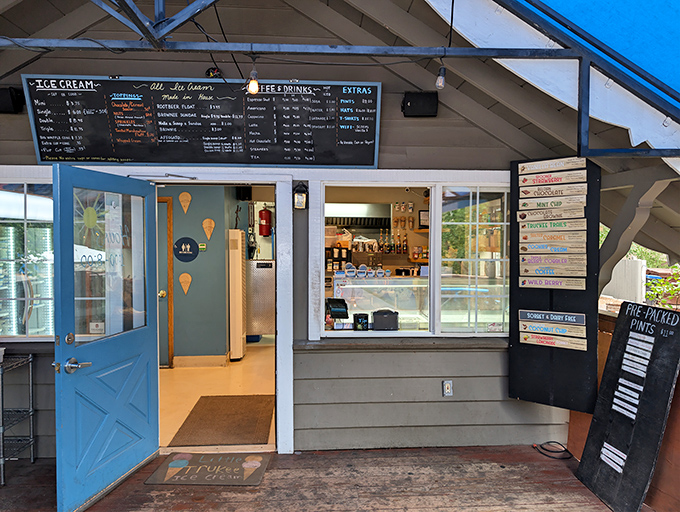 Little Truckee Ice Cream's cheerful blue door welcomes visitors to a world of small-batch frozen delights – summer's perfect mountain companion.