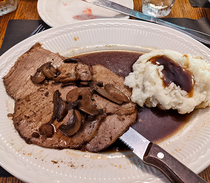 Tender roast beef paired with saut&eacute;ed mushrooms and homestyle mashed potatoes creates the comfort food trifecta that makes Monday meetings bearable.