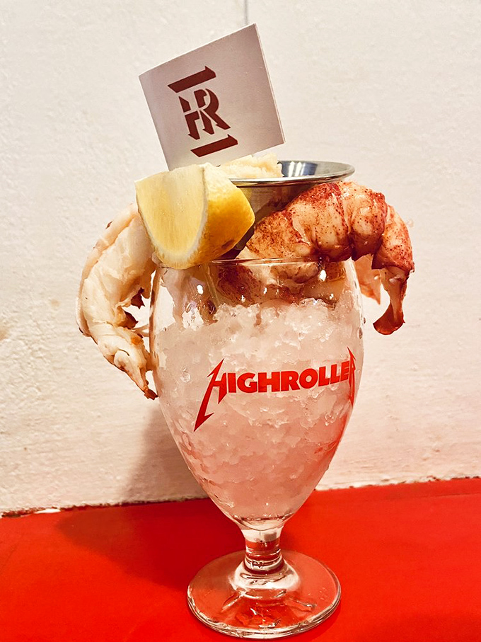 A cocktail glass filled with ice cradles plump lobster and shrimp. It's jewelry from the sea, and yes, you can eat it.