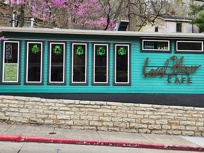 Local Flavor Cafe's turquoise facade and shamrock windows hint at the colorful culinary personality waiting inside this hillside eatery.