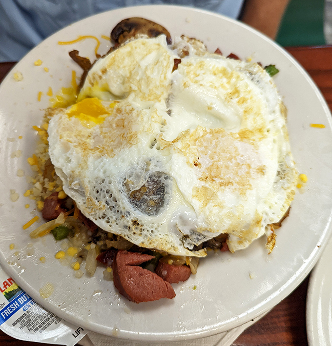 That Low Country Skillet brings hash, eggs, and enough flavor to jumpstart your morning like a caffeinated superhero origin story.