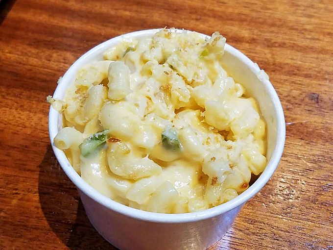 Mac and cheese so creamy it could double as comfort food therapy, the perfect dairy-based counterpoint to all that smoke.