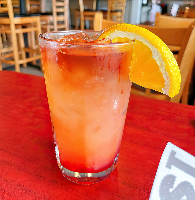 This refreshing cocktail isn't just a drink &ndash; it's the perfect palate cleanser between bites of smoky goodness, like a tropical vacation in a glass.