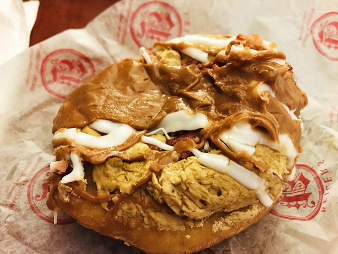 Breakfast's identity crisis never tasted so good. This maple bacon donut combines sweet, savory, and sinful in a way that makes nutritionists weep and taste buds rejoice.