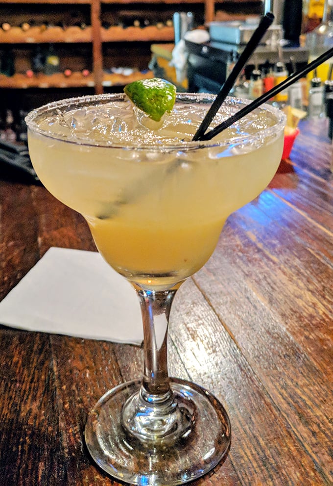 A margarita with a proper salt rim reminds you that steakhouses can handle cocktails just as well as beef.