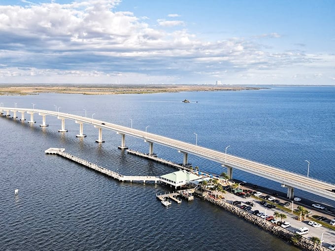 Max Brewer Bridge stretches across the water like a concrete invitation to slow down and watch life float by.