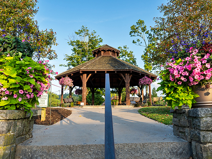 This gazebo surrounded by flowers looks like it's auditioning for a wedding magazine cover&mdash;and absolutely nailing it.