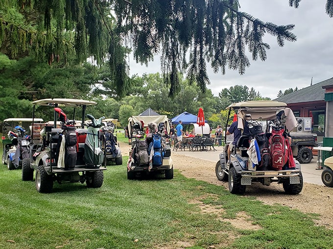 Golf carts await their next adventure at the local country club, where membership costs less than a monthly parking spot in Chicago.