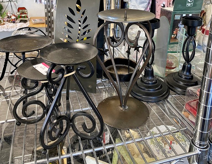 Gothic romance meets practical illumination in these wrought iron candle holders &ndash; perfect for both dinner parties and summoning friendly spirits.