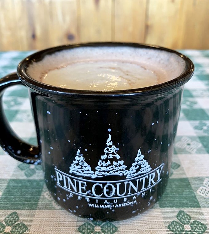 Their signature mug doesn't just hold coffee&mdash;it cradles liquid happiness. In the pine-decorated ceramic, even ordinary coffee transforms into a mountain morning ritual. 