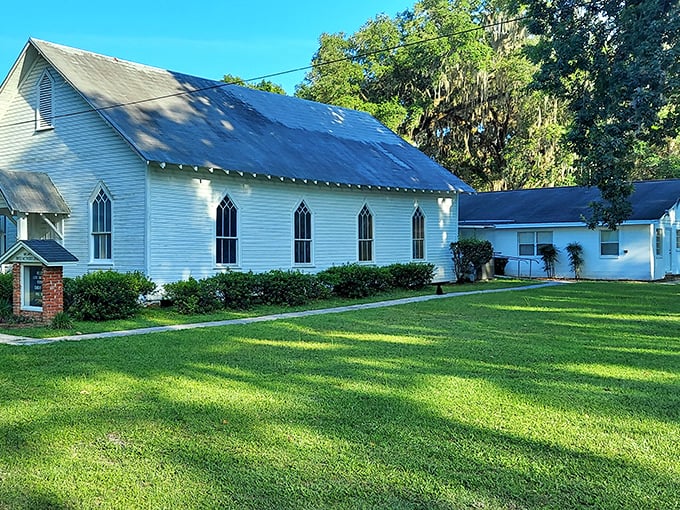 This pristine white church has heard more prayers, weddings, and gossip than a hairdresser with a 50-year career in a small town.
