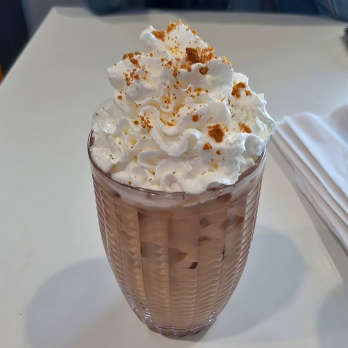 Whipped cream mountain atop a milkshake valley &ndash; this isn't just a drink, it's dessert with a straw and zero regrets.