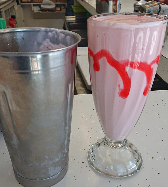 In a world of artisanal everything, there's something rebelliously delightful about a classic strawberry milkshake served in a metal mixing cup.