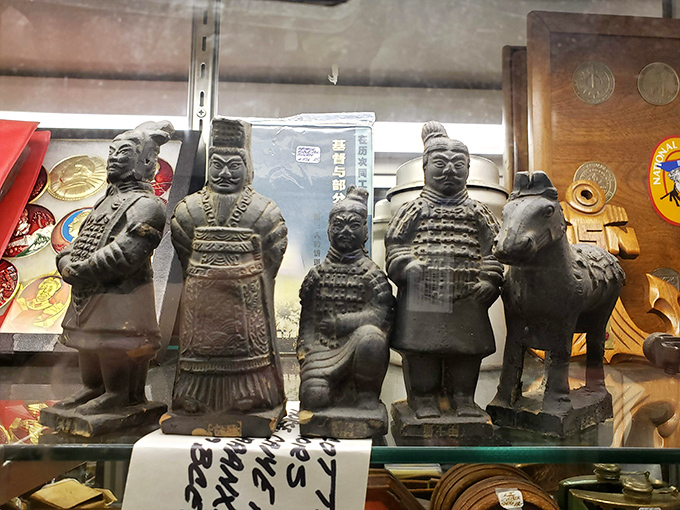 These miniature Terracotta Warriors stand guard over the collectibles section, tiny sentinels with impressive historical gravitas.