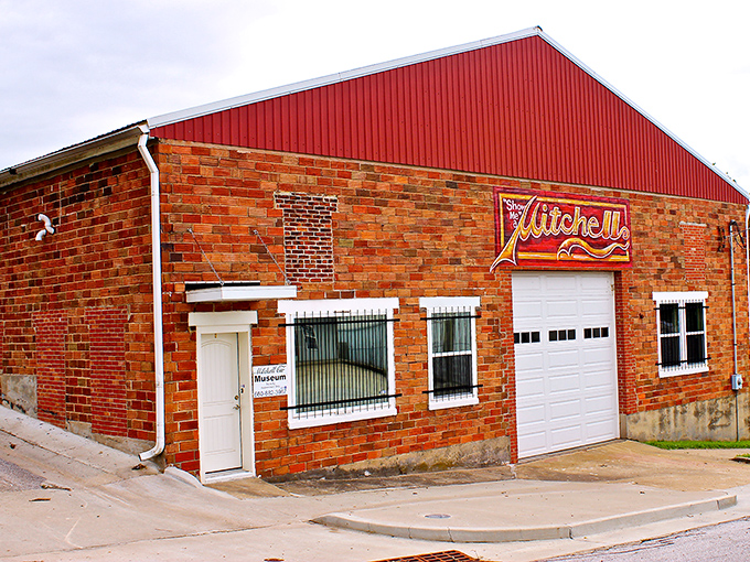 The Mitchell Collection Museum's brick exterior and vintage signage hint at automotive treasures within. Gearheads and history lovers, your happy place awaits.