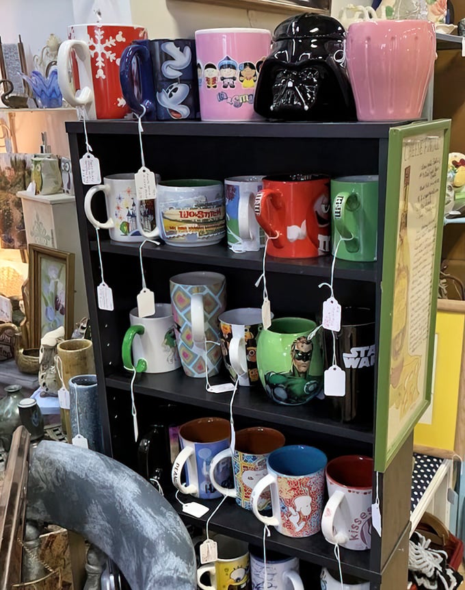 Darth Vader guards a collection of mugs that spans from Disney classics to superhero sips &ndash; morning coffee with a side of nostalgia.