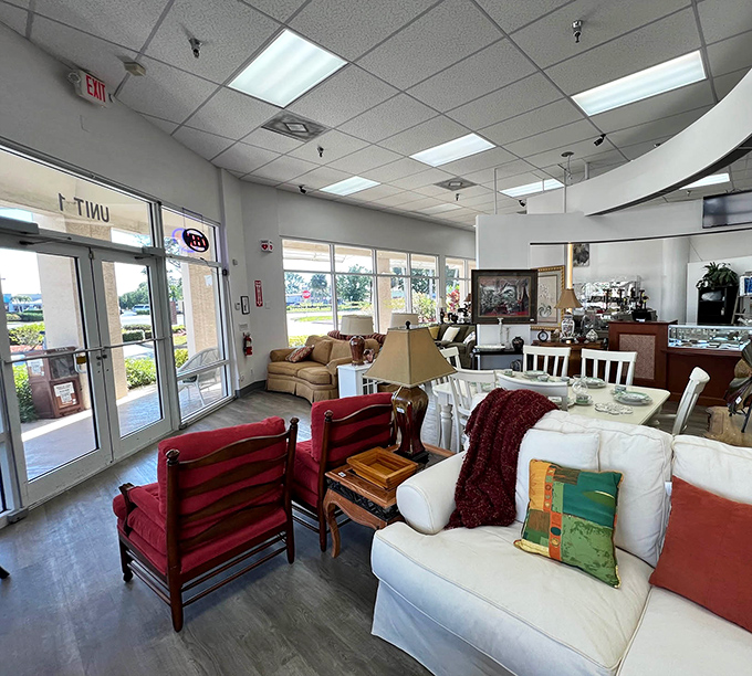 Natural light floods the entrance area, highlighting an inviting display of furniture that makes you wonder why anyone would ever pay full retail prices again.