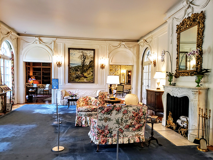 Floral-patterned furniture that somehow doesn't look like your grandmother's living room, set against walls that have witnessed conversations we can only imagine.